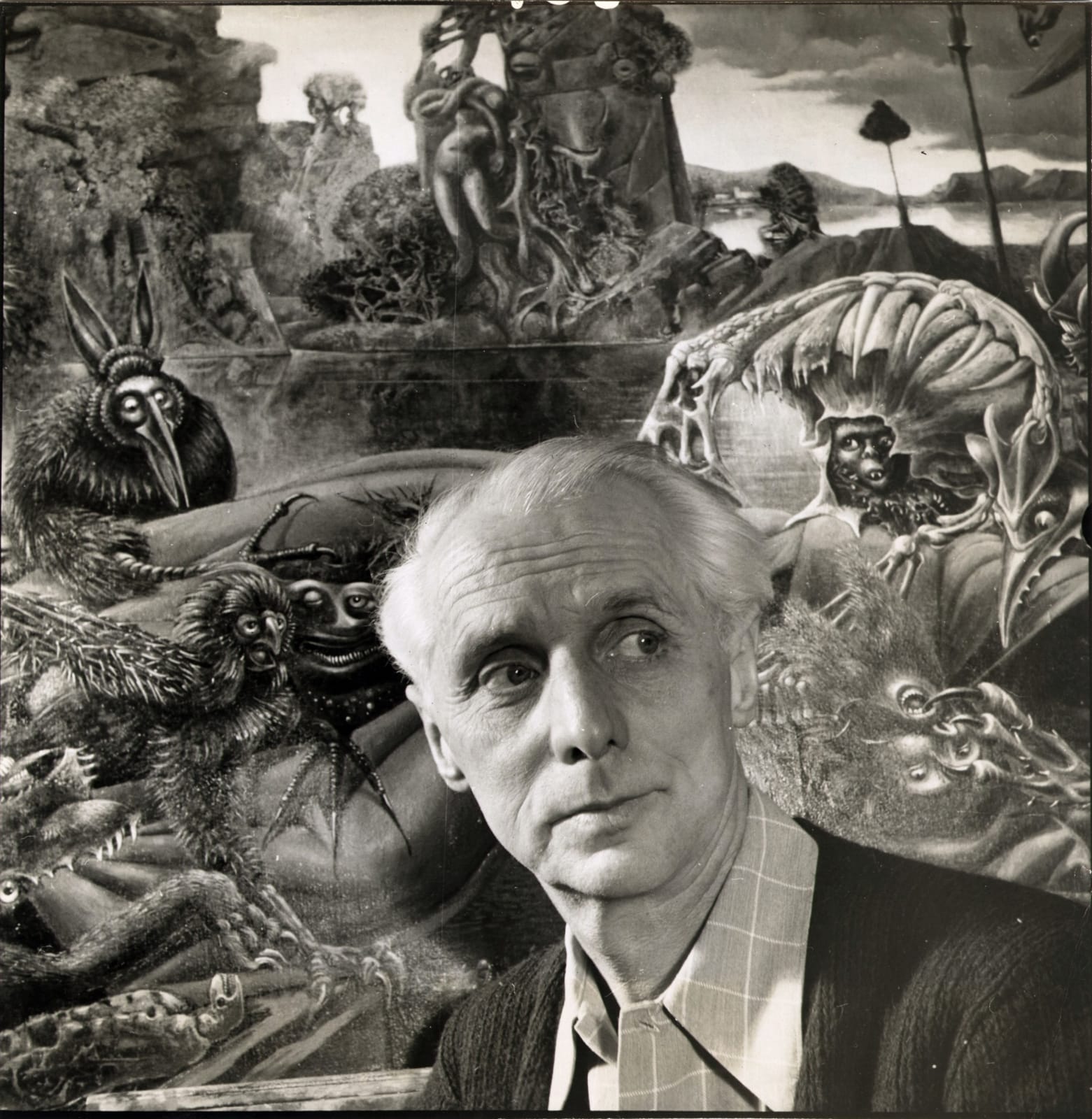 Claud Huston, Max Ernst in front of his painting "The Temptation of ...