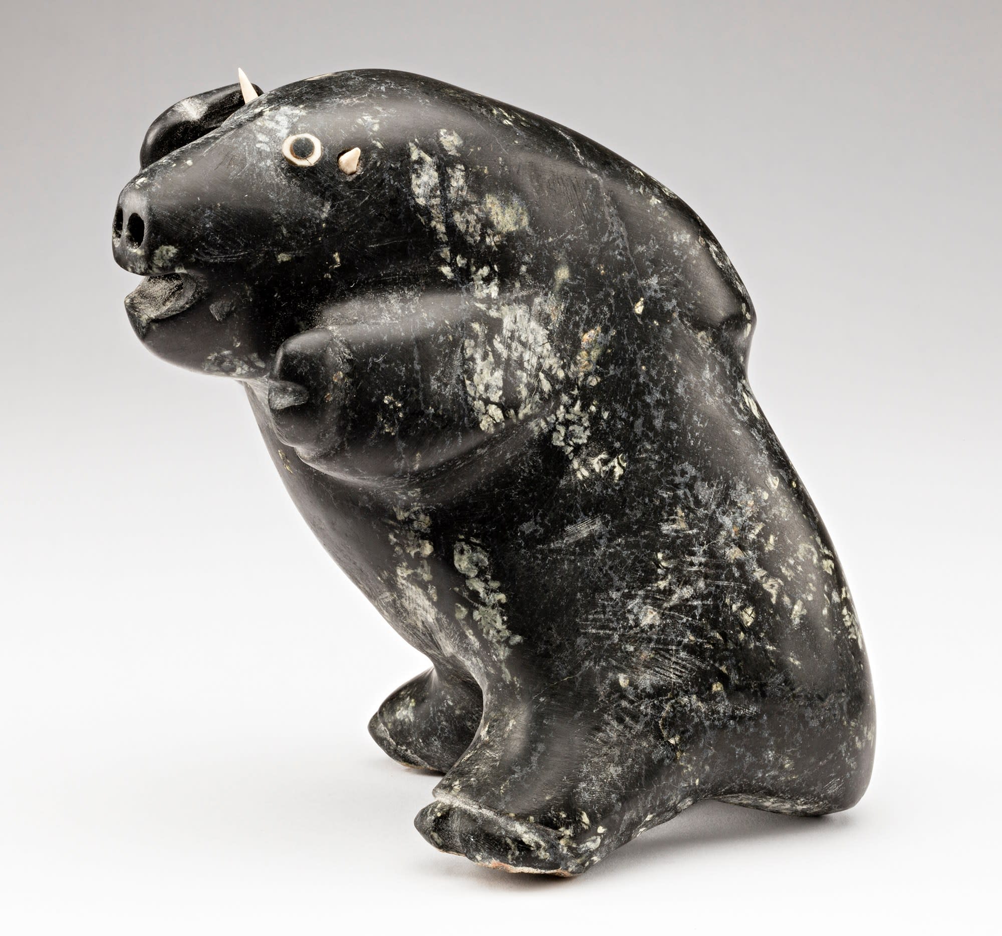 JUDAS ULLULAQ (1937-1999) UQSUQTUUQ (GJOA HAVEN), Rearing Muskox Calf ...