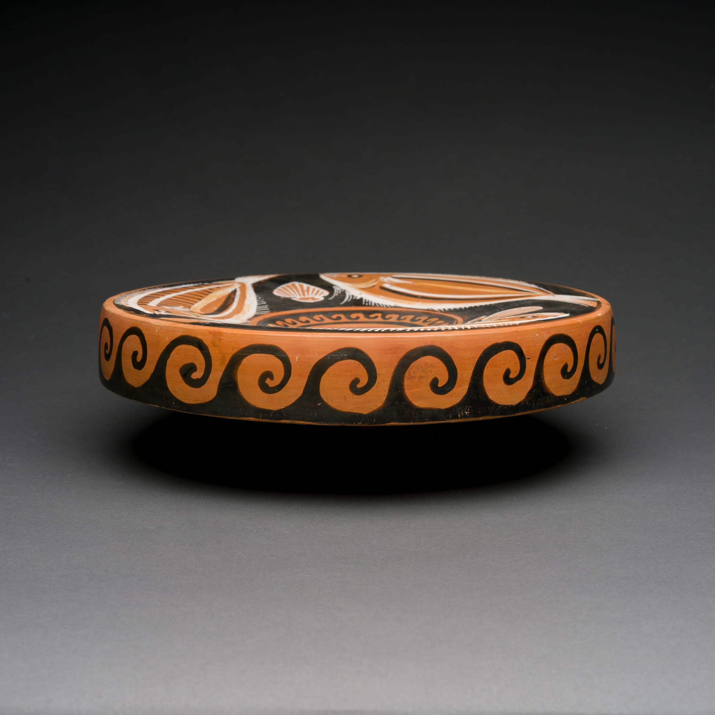 Apulian Red -Figured Fish Plate, 400 BCE - 300 BCE | Barakat Gallery