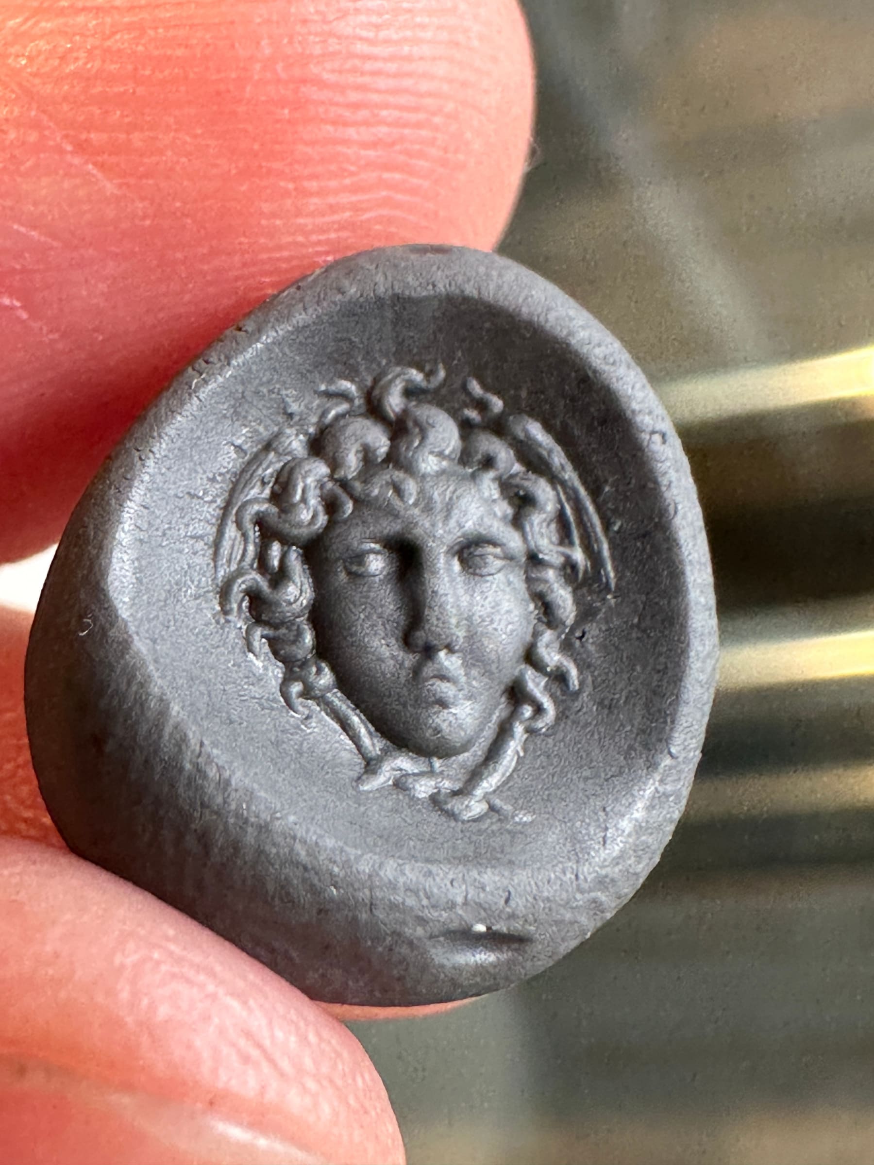 *, A banded onyx Medusa intaglio mounted as a gold pendant | Symbolic ...