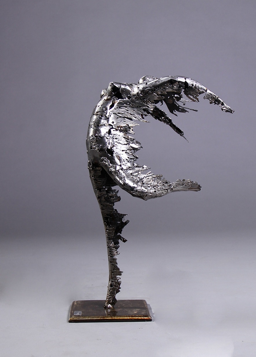 Forging Beauty: Exploring the Timeless Craftsmanship of Iron Sculptures ...