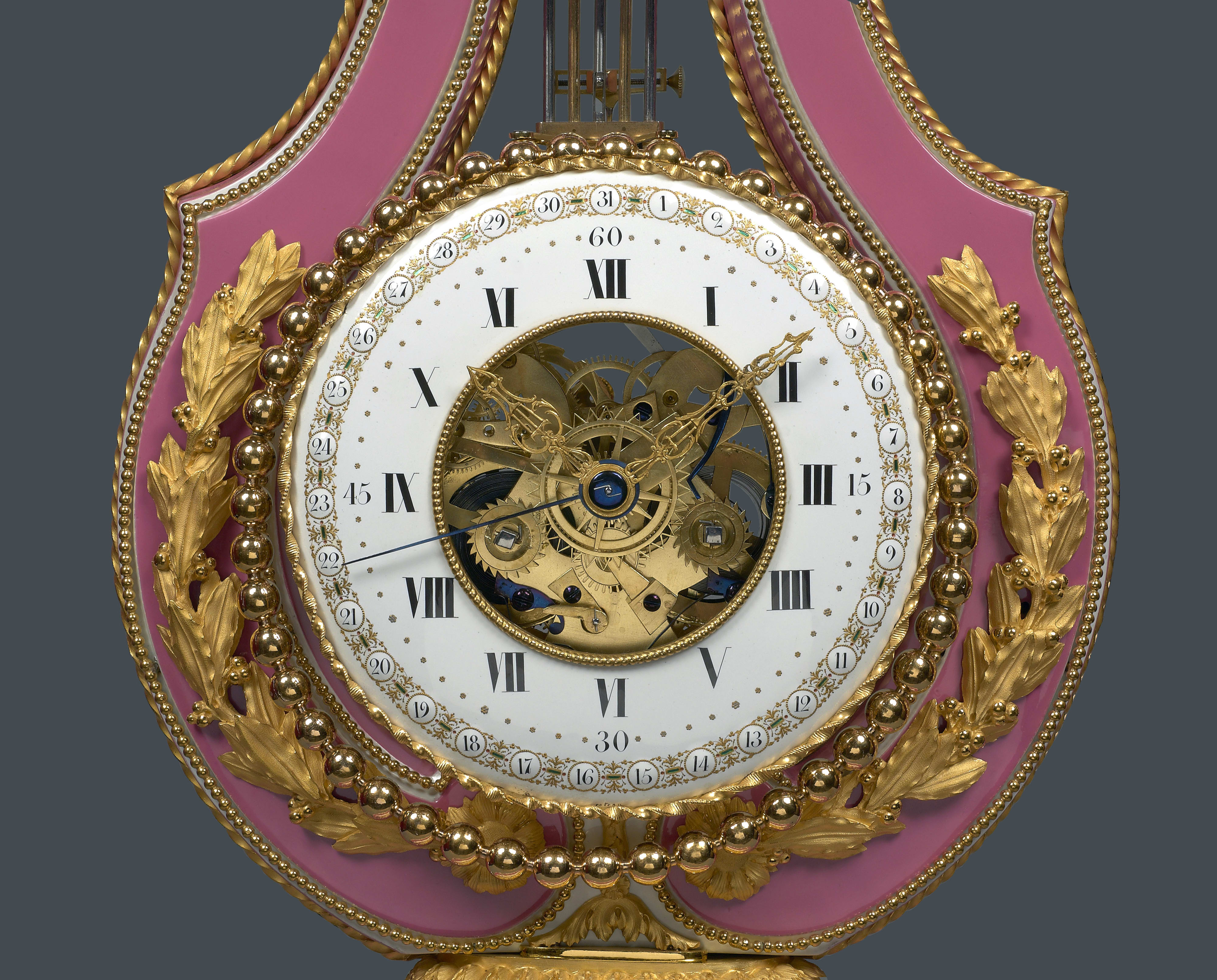 Joseph Coteau, A Louis XVI skeletonised lyre clock, enamel work by ...